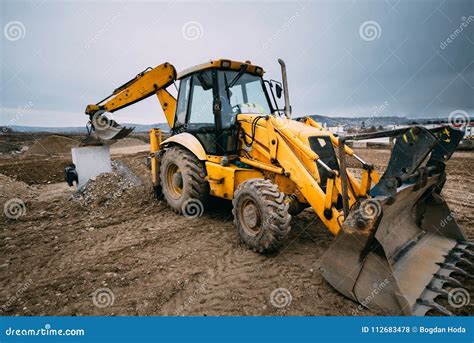 Close Up Details Of Massive Working Machinery Industrial Backhoe