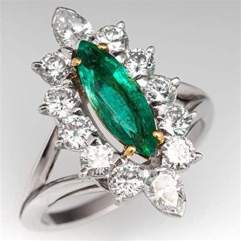 Marquise Cut Emerald Ring W Diamond Halo
