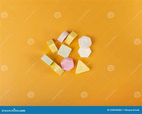 Tablet Candies On Yellow Background Compressed Tablets Stock Image