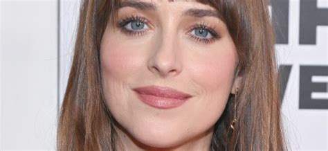Dakota Johnson Frees The Nipple In Yellow String Bikini