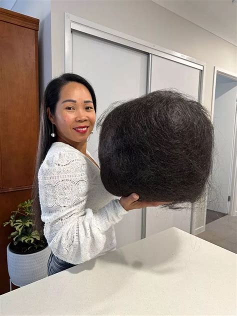 People Baffled As Woman Shows Off Monster 23 Year Old Hair Ball The