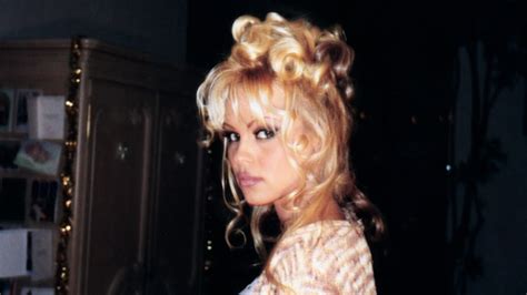First Look At Pamela Anderson Doc Reveals Rare Pics Of The Star