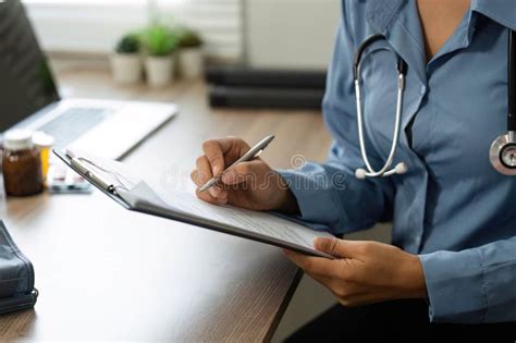 Documentation And Patient Care A Nurse Records Patient Information