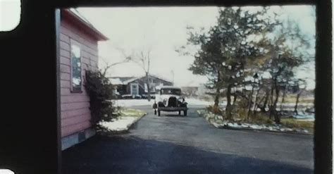 Vintage Car In Snowy 1950s Suburban Driveway Free Stock Video Footage