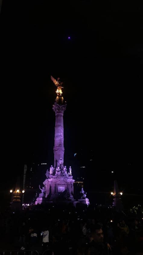 Ángel De La Independencia At Night With Purple Lights