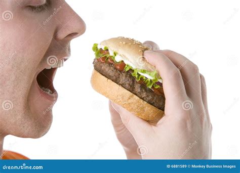 Man About To Bite Into A Cheeseburger Stock Image Image Of Meal