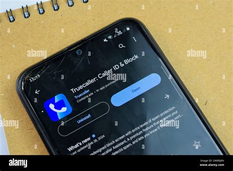 truecaller caller id and block application on smartphone screen