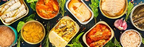 A Top View Of Open Tin Cans With Canned Salmon Mackerel Sprat Sardine Tuna Herring And