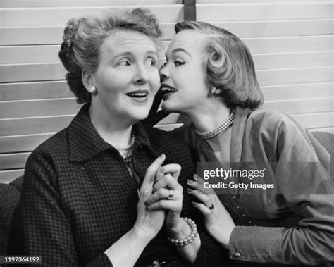 Mom Telling Secret Photos And Premium High Res Pictures Getty Images