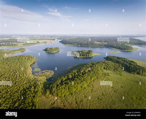 Aerial View Of Green Islands And Clouds At Summer Sunny Morning