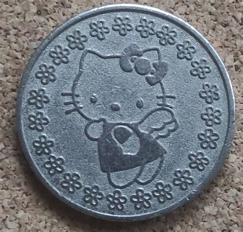 Hello Kitty Doraemon Token On Carousell