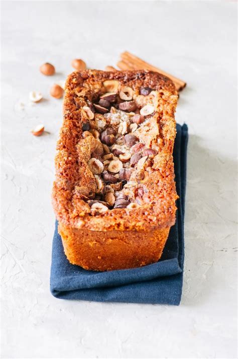 Pumpkin Espresso Bread With Hazelnuts On A Blue Napkin On A Whit Stock
