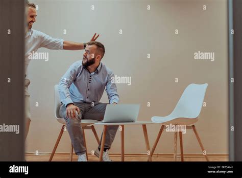 Programmers Have Fun On A Break From Work While Working Together To Solve Various Programming