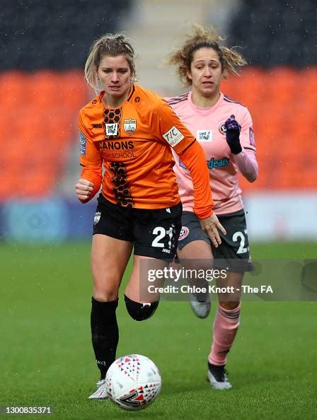 Florence Gamby Of London Bees Runs With The Ball Whilst Under News