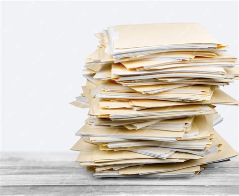 Premium Photo File Folder Stack On Desk