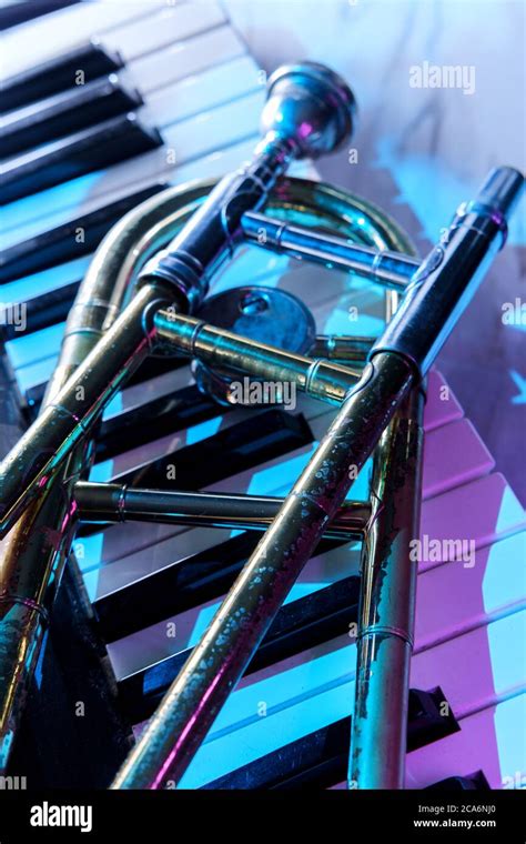 Old And Worn Jazz Slide Trombone And Piano Keyboard Musical Show And