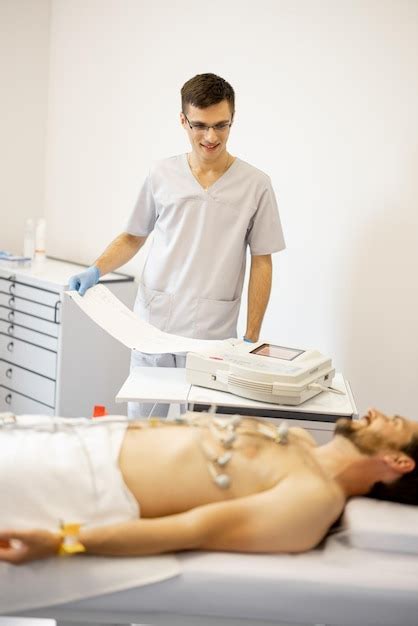 Premium Photo Cardiogram Procedure In The Clinic