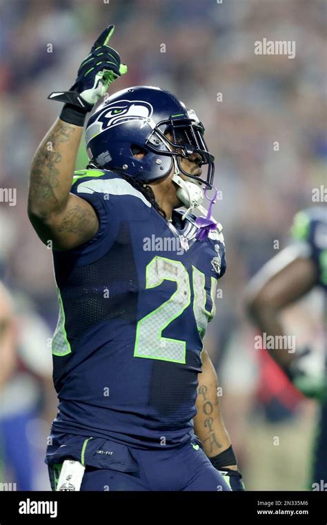 Seattle Seahawks Running Back Marshawn Lynch 24 Celebrates A Gain