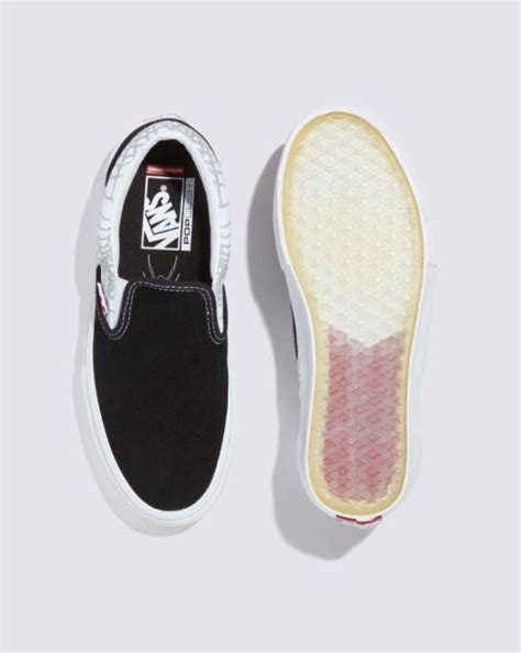 Shop Vans Skate Black Widow Spider Slip On In Black And White