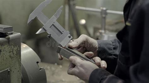Factory Worker Measuring Metal Parts Production Quality Control