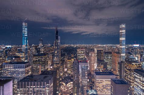 Aerial View Of High Rise Buildings Located On Street Of Manhattan