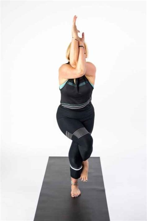 How To Do Eagle Pose In Yoga Garudasana Yogacanada