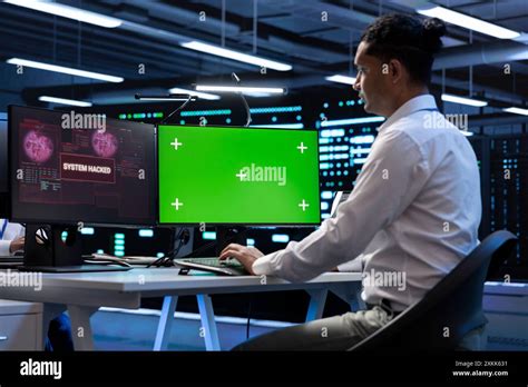 Engineer In Server Hub Using Green Screen Pc To Stop Hacker Passing Company Firewall And