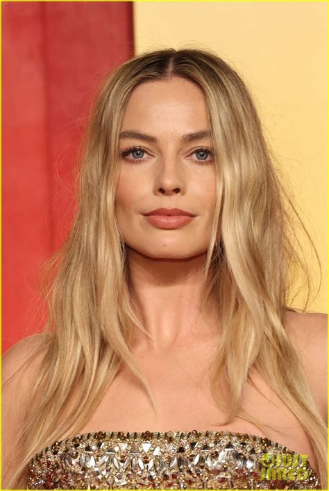 Margot Robbie Rocks Gold Mini Dress For Vanity Fair Oscars Party 2024
