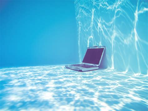 Laptop Underwater In A Swimming Pool Clarity Advantage