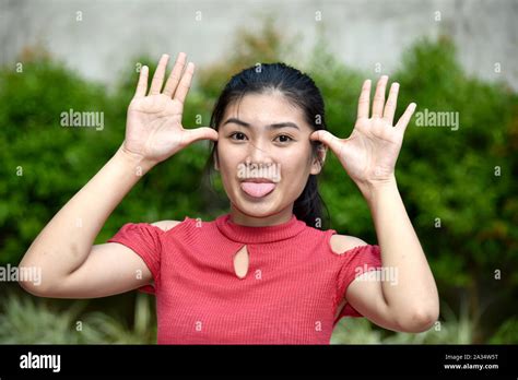 Asian Girlfriend Meme Poster Happy Teenage Asian Girl Sitting On Couch