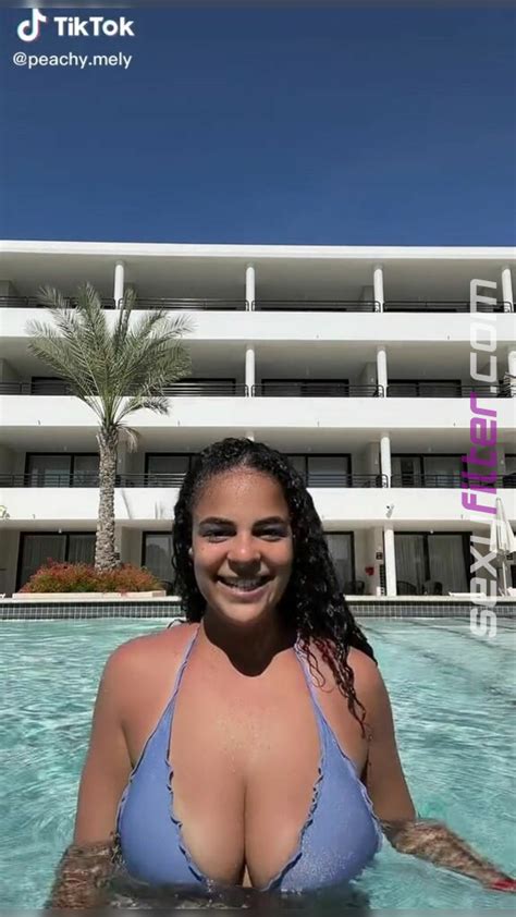 Cute Peachymely Shows Cleavage In Blue Bikini At The Swimming Pool