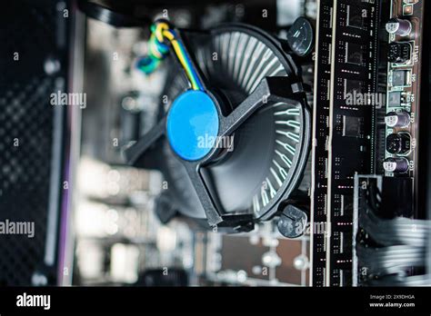 Close Up View Of A Computer Cpu Cooler With A Fan Inside A Desktop Pc The Image Shows The