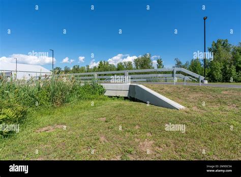 Three Sided Precast Concrete Bridge With Guide Rails Installed Over A Wetland Precast Bridge