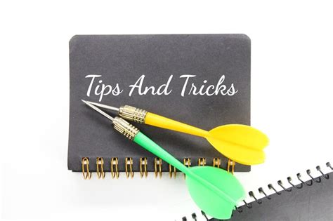 Premium Photo A Notepad With A Green Arrow And The Words Tips And