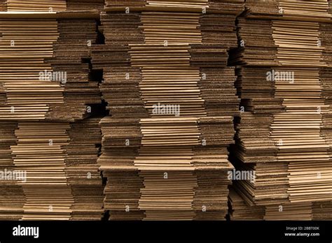 Supply Of Unassembled Cardboard Boxes In The Warehouse Stack Of