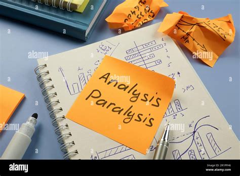 Analysis Paralysis Concept Notepad With Graphs And A Sticker With The