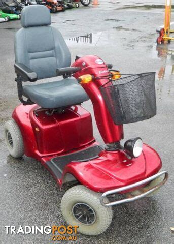Red Merit Explorer Mobility Scooter With Accessories