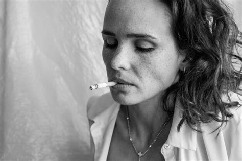 Premium Photo Close Up Portrait Of Woman Smoking Cigarette