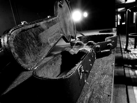 Premium Photo Guitar Box On Wooden Table