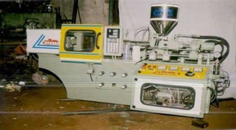 Mini Injection Molding Machine By NATRAJ MACHINE MANUFACTURERS Mini Injection Molding Machine