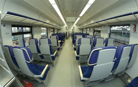 2 Class Compartment Of The Wagon Of Commuter Train Seats And Doors
