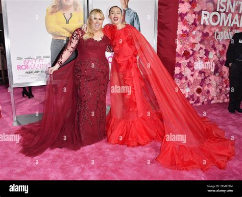 L R Rebel Wilson And Miley Cyrus At The Isnt It Romantic Los