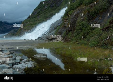 View Of Nugget Falls Waterfall With The Mendenhall Glacier In The