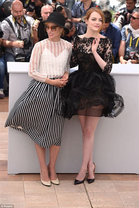 Emma Stone Dazzles In Figure Hugging White Dress As She Attends The