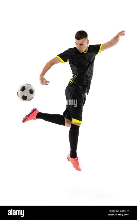 Dynamic Portrait Of Professional Male Football Soccer Player Training Isolated On White Studio