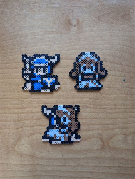 The Hero And Princess Sprites From The Gbc Port Of Dqi Made From Perler