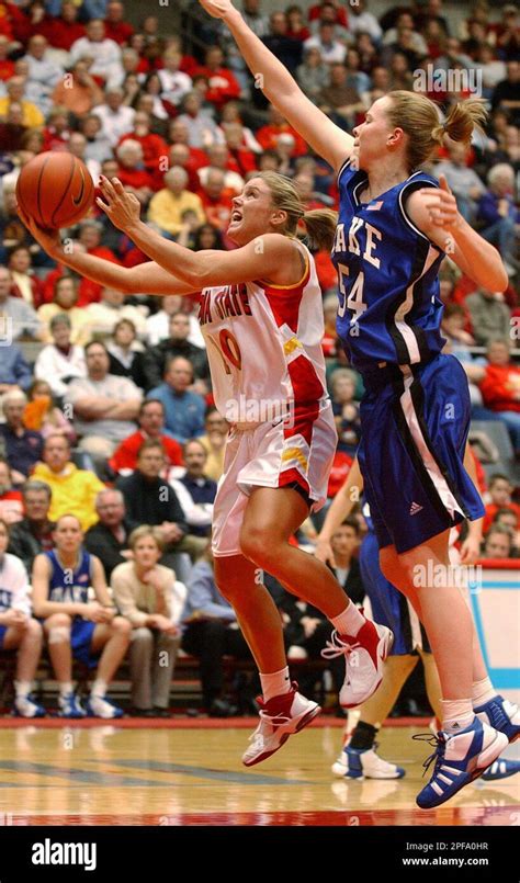 Iowa States Erica Junod Left Drives To The Basket Past Drakes Carla