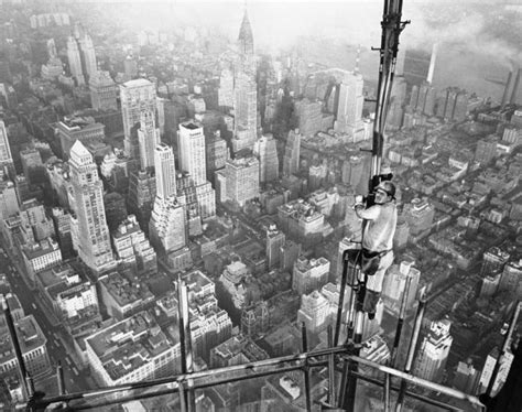 A Bridgeman With Us Steel Climbs Atop The Empire State Building On