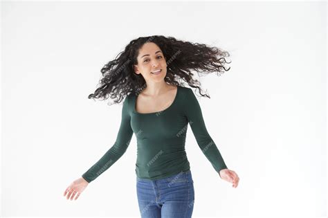 Premium Photo Natural Portrait Of Brunette Girl Shaking Her Hair On