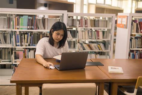 Young Student Eagerly Enters The Classroom Ready To Immerse Themselves